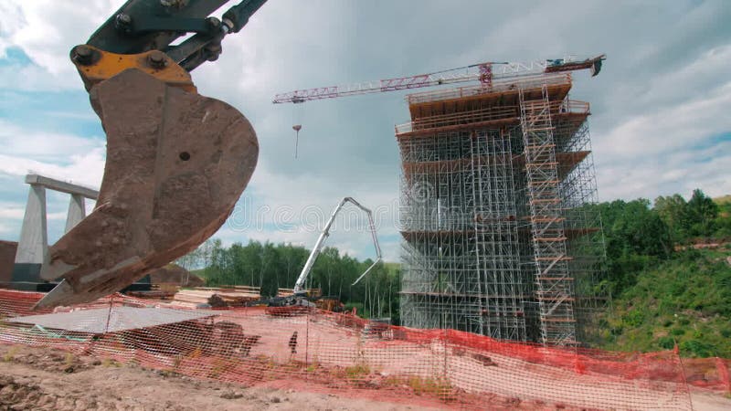 Large Excavator Bucket Against Support at Construction Site Stock Video ...