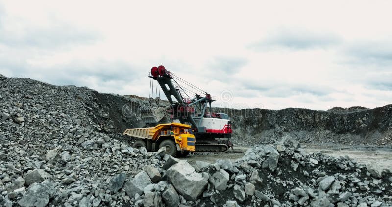 Excavator Loading Dump Truck in Open Pit Mine. Stock Clip Stock Footage ...