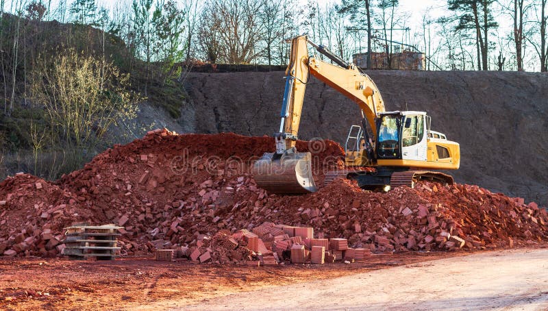 A large excavator at work. stock image. Image of large - 143452449