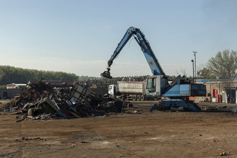 Large Excavators Work on Scrap Metal Stock Image - Image of pile ...