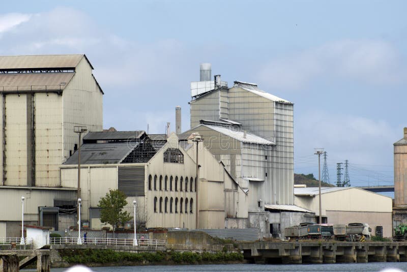 Large Factory with Blue Sky in the Background Stock Image - Image of ...