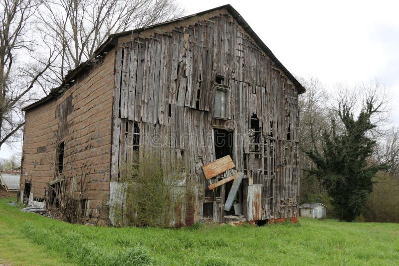 Rundown Barn stock photo. Image of wood, blue, rust, trees - 293632