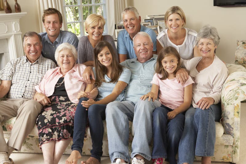 Large Family Group Sitting on Sofa Indoors Stock Image - Image of group ...