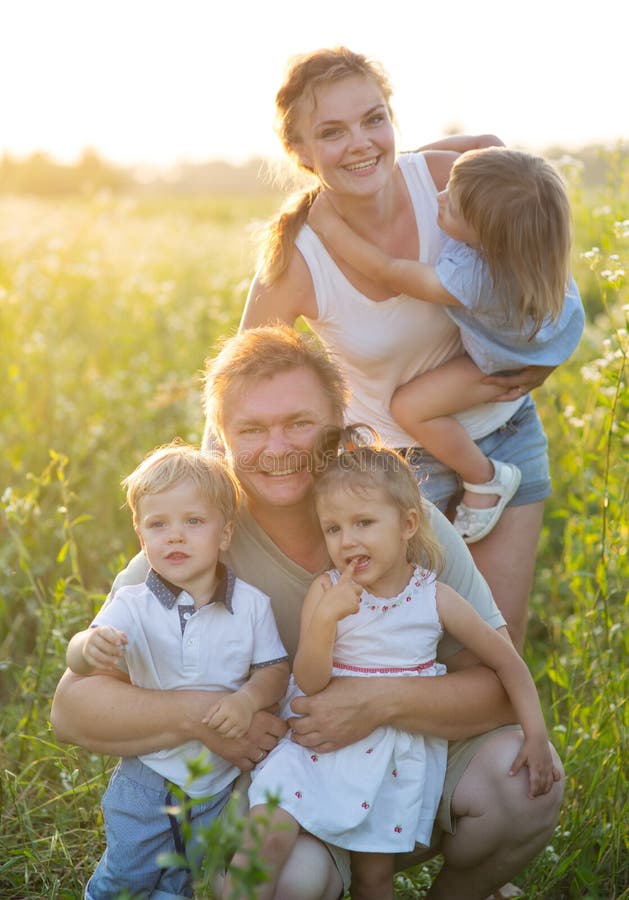 Large family on a walk stock image. Image of summer, playing - 97931563