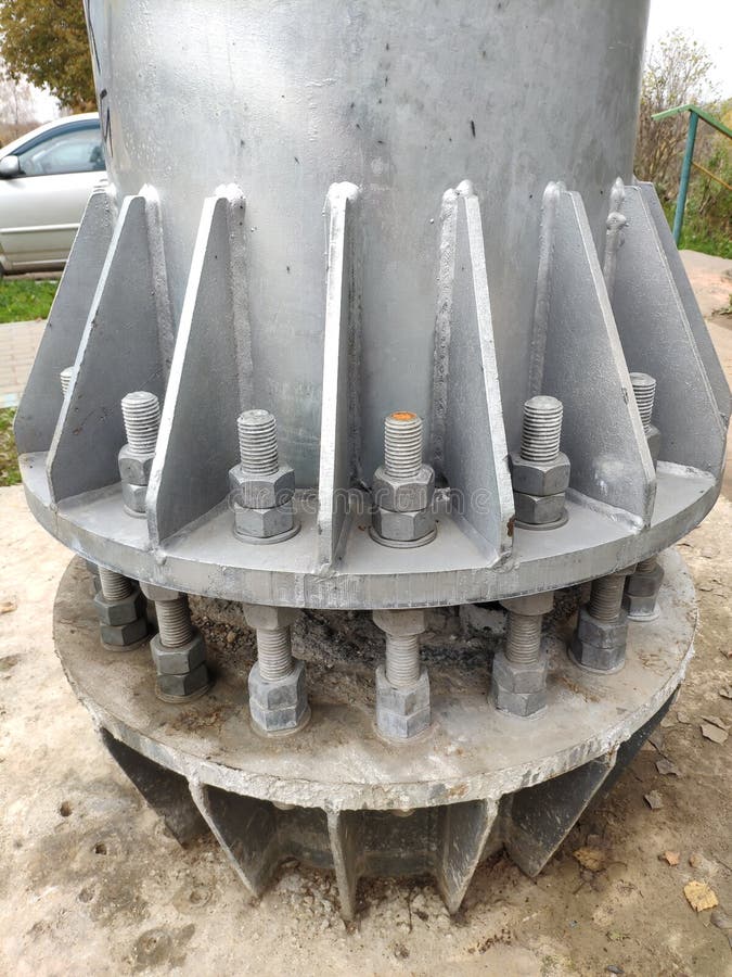 Large Fasteners, Screws and Nuts on the Base of the Metal Post. Bracing ...