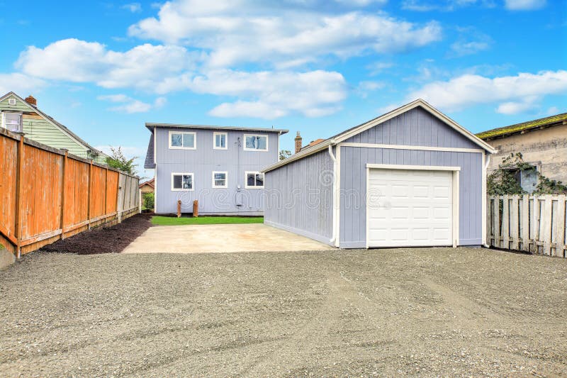 Large Fenced Back Yard with a Garage. Stock Image - Image of style ...