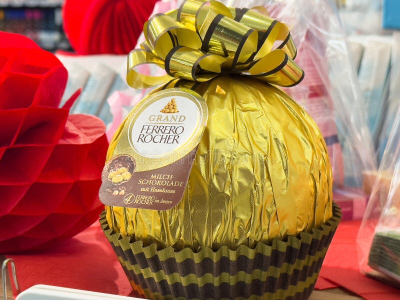 Large Ferrero Rocher Chocolate Wrapped in Gold Foil with Decorative Bow ...