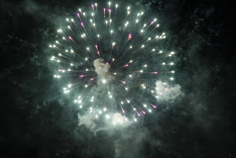 Large Firework Detonating at Night Stock Image - Image of light, glow ...