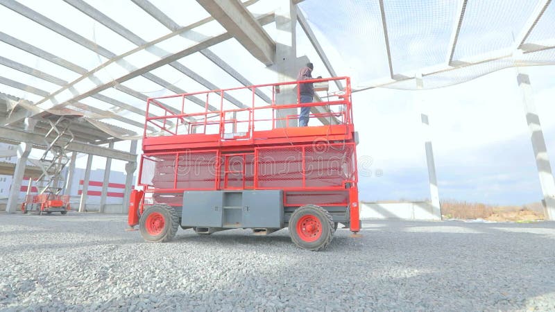 Mobile Lifting Platform at the Construction Site. Professional ...