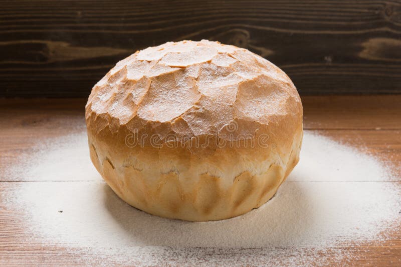 Large Fresh Bread Loaf on a Wooden Table, Rustic Style Stock Image ...