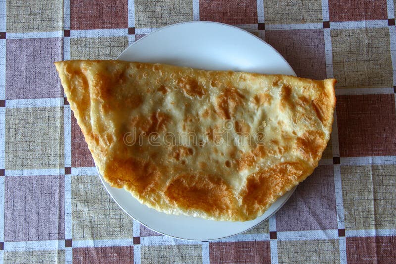 Large Fried Cheburek on a Plate Stock Photo - Image of interior ...