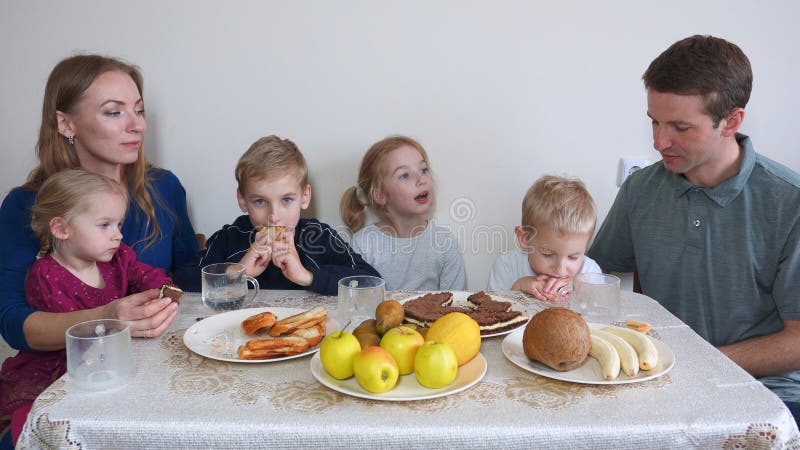 A Large and Friendly Family Has Lunch at Home. Stock Photo - Image of ...