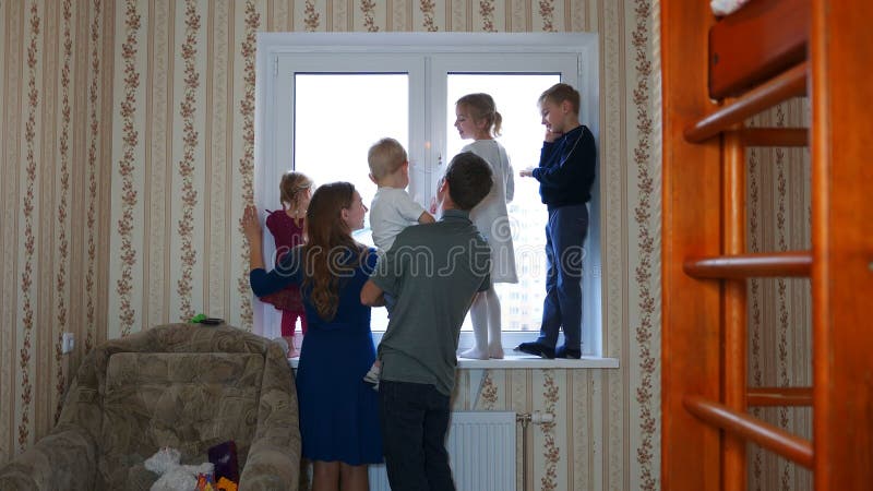 Large and Friendly Family at the Window during Quarantine. Stock Photo ...