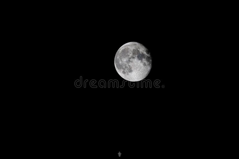 A Large Full Moon Rises Over a Tree Line at Night Stock Photo - Image ...