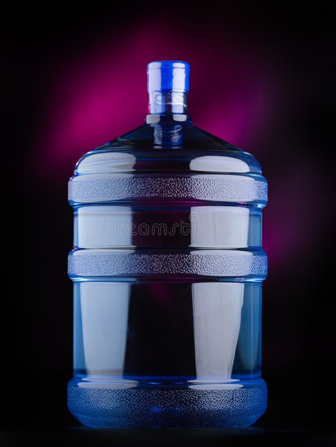 Large Gallon of Water on Black Background with Pink Tints Stock Photo ...