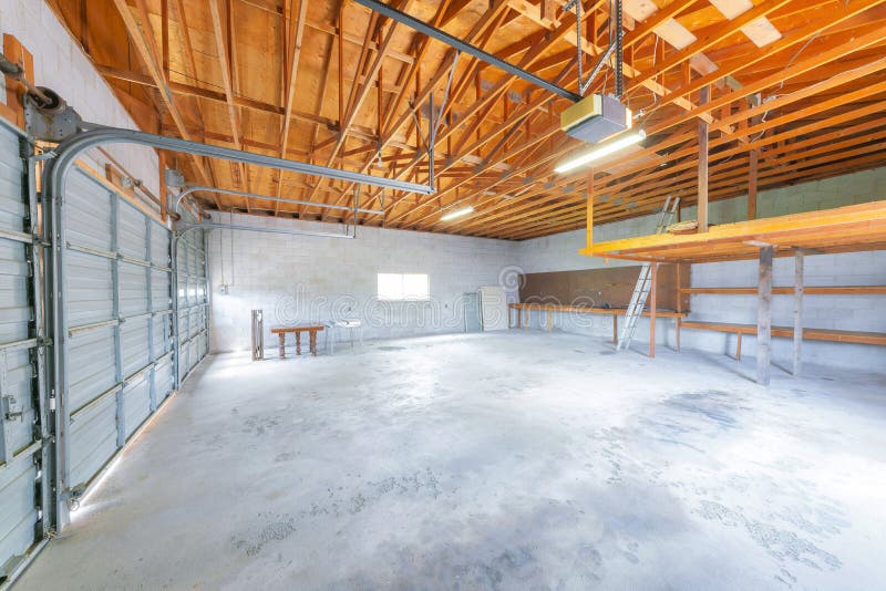 Large Garage Interior with Automatic Door Operator Machine Stock Image ...