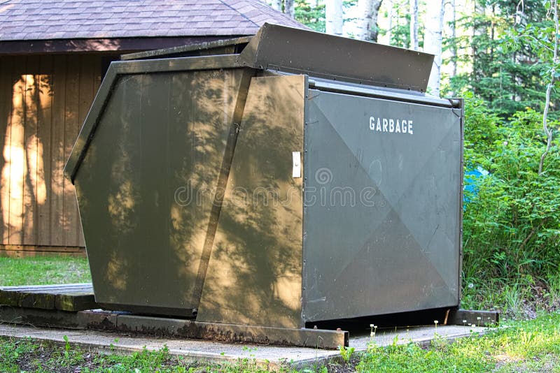 A Large Garbage Bin at a Campground Stock Image - Image of barrel ...