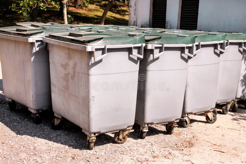 Large Garbage Containers, Trash Dumpsters and Bins Standing in Row ...