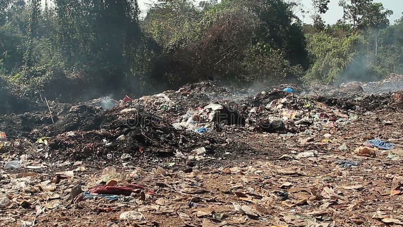Garbage Dump Waste with Smoke at Sunny Day Stock Footage - Video of ...