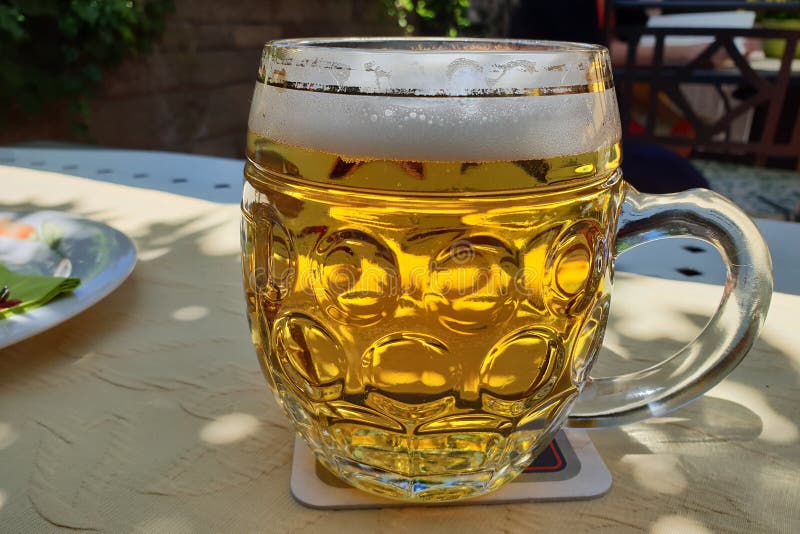 Large Glass of Cold Beer on a Coaster Stock Image - Image of large ...