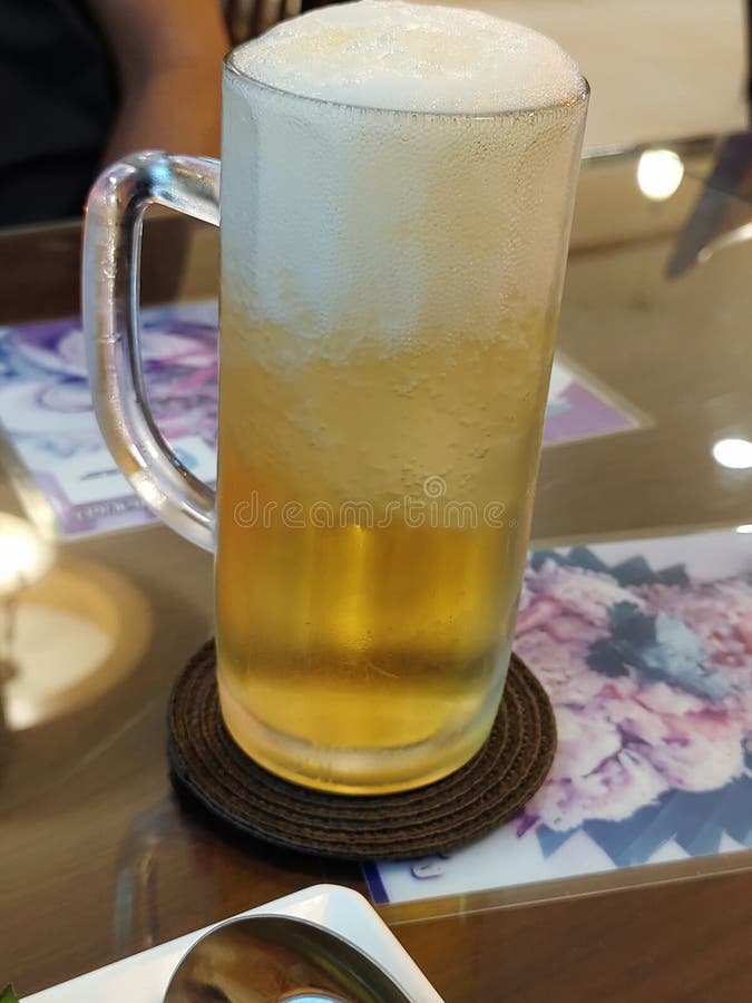 A Large Glass Building with a Lot of Windows and a Large Entrance Stock ...