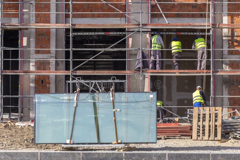Large Glass Ready for Build in Stock Photo - Image of hardhat, rope ...