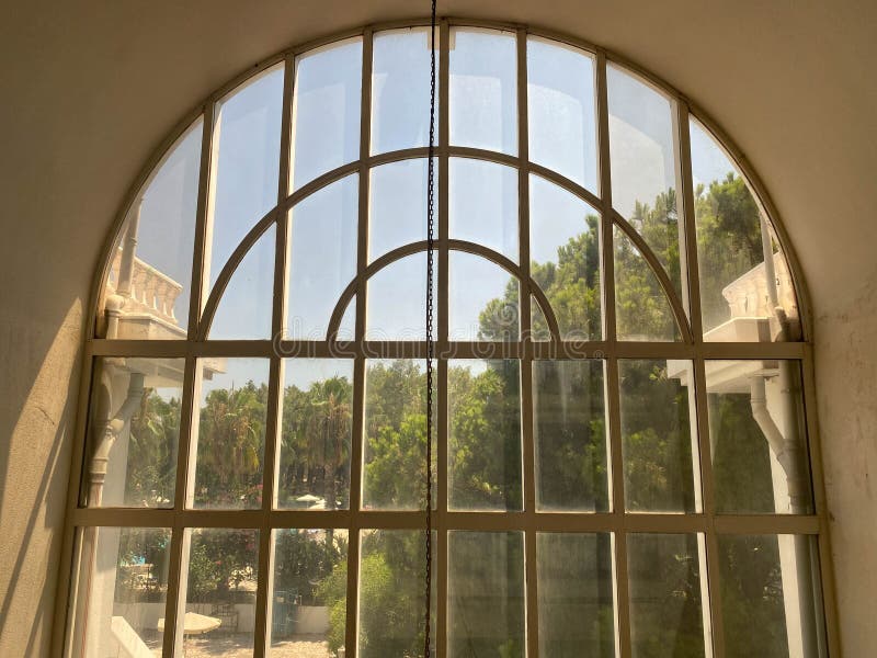 A Large Gothic Window among the Columns Stock Photo - Image of light ...