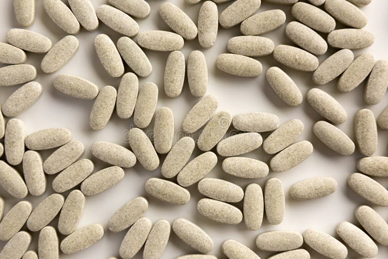 Large Gray Pills Macro on White Background Stock Image - Image of ...