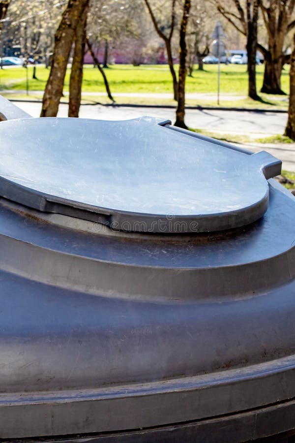 Large Plastic Trash Can in the Park Stock Image - Image of environment ...