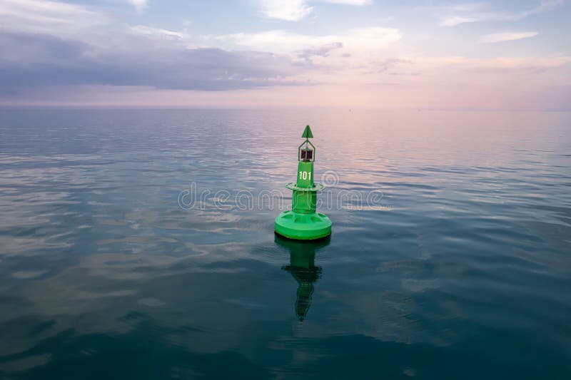 Large Green Buoy with Solar Panelsin the Sea Stock Photo - Image of ...