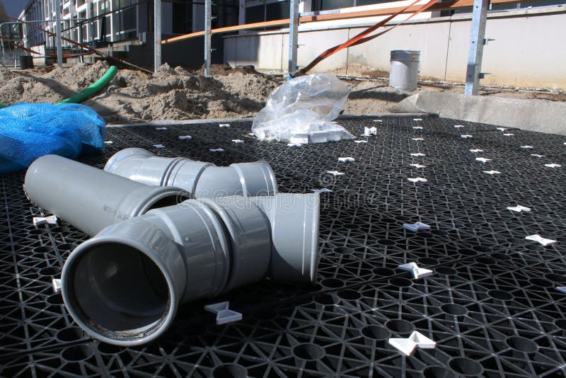 Large Grey Pcv Pipes Laying at an Unfinished Construction Site Stock ...