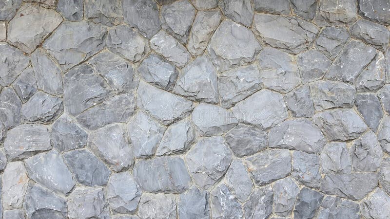 A grey round spiral stone stock photo. Image of detail - 111910038