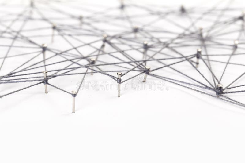 A Large Grid of Pins Connected with String. Communication, NetwA Large ...