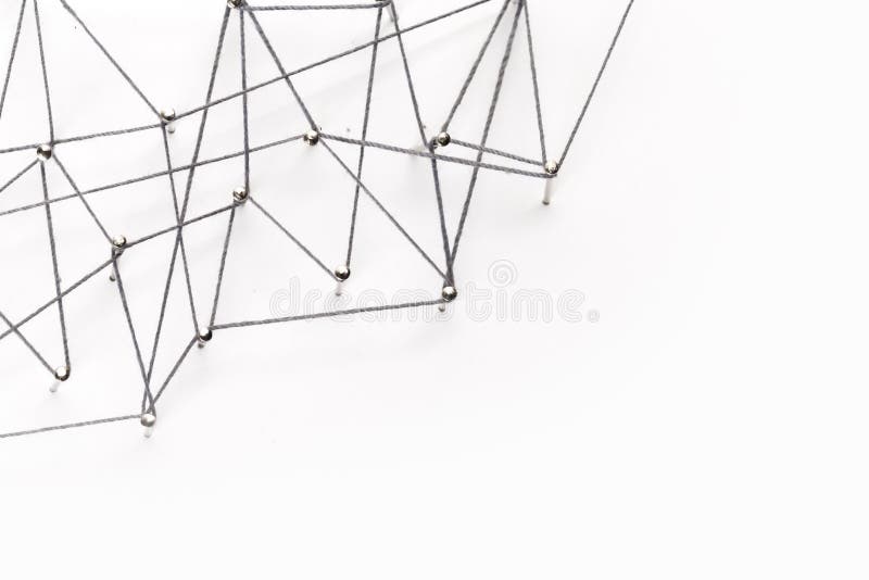 A Large Grid of Pins Connected with String. Communication, NetwA Large ...