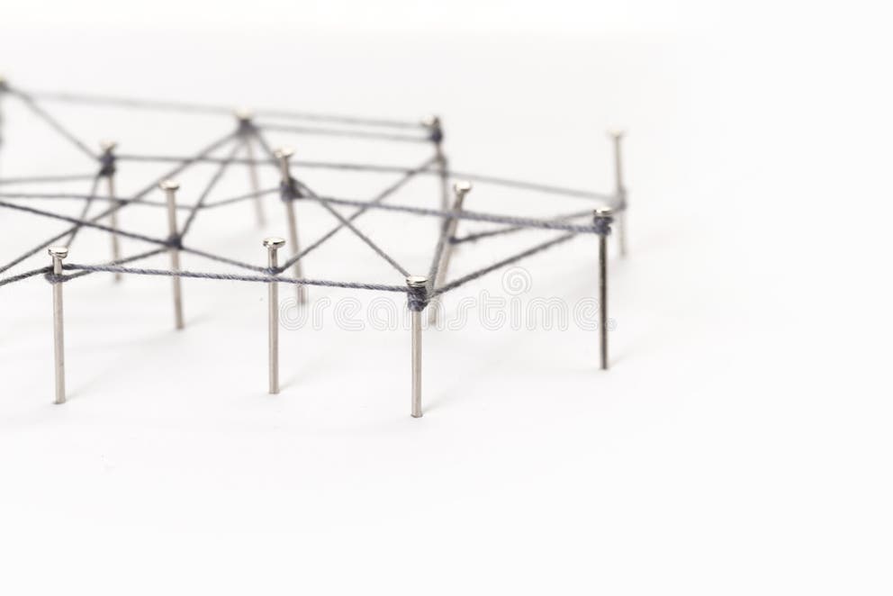 A Large Grid of Pins Connected with String. Communication, NetwA Large ...