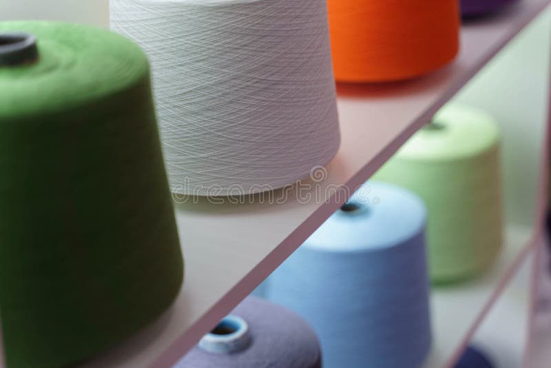 Large Group of Bobbin Thread Cones on the Shelf Stock Photo - Image of ...
