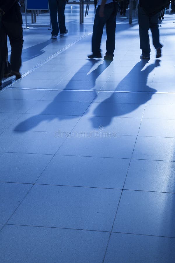 Large Group of Business People Walking, Blue Toned Image Stock Photo ...