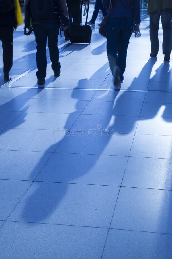 Large Group of Business People Walking, Blue Toned Image Stock Photo ...