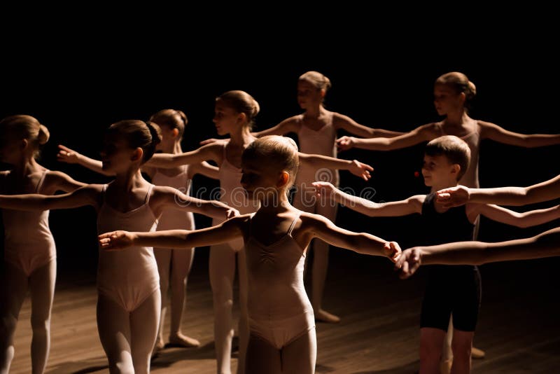 A Large Group of Children Rehearsing and Dancing the Ballet. Stock ...