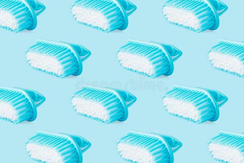 A Large Group of Cleaning Brushes on a Blue Plain Background. Pattern ...