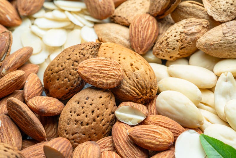 Large Group of Different Almond Nuts Close-up. Food Background Stock ...