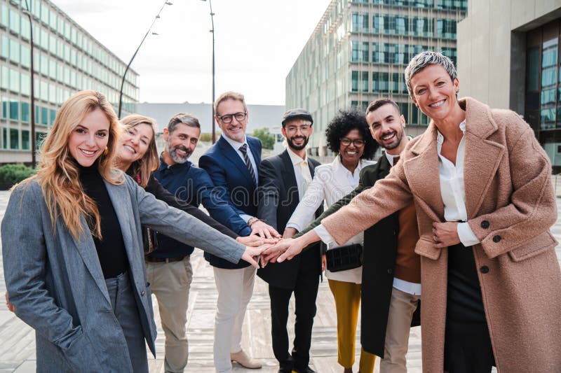 Large Group of Diverse Business People Standing Outdoors, Smiling, and ...