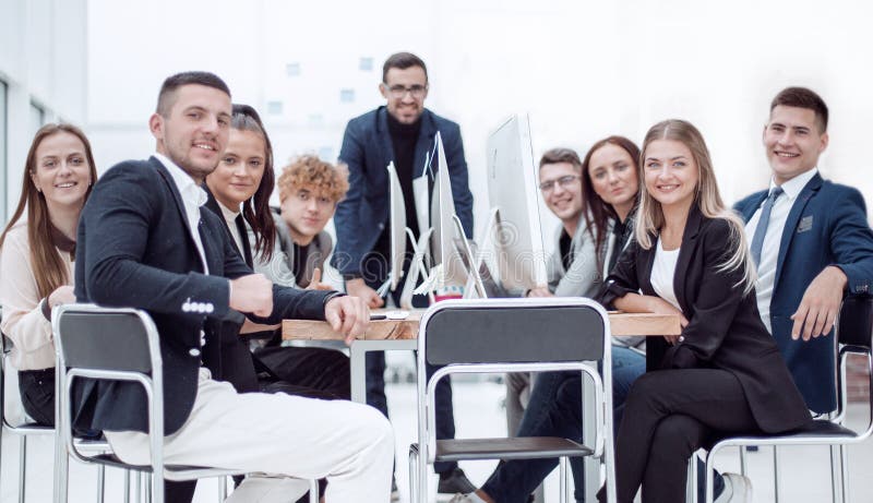 Large Group of Employees Sitting at Office Desk. Stock Photo - Image of ...
