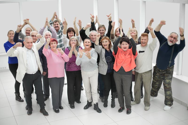 Large Group of Happy People Applauding Thier Team Victory Stock Image ...