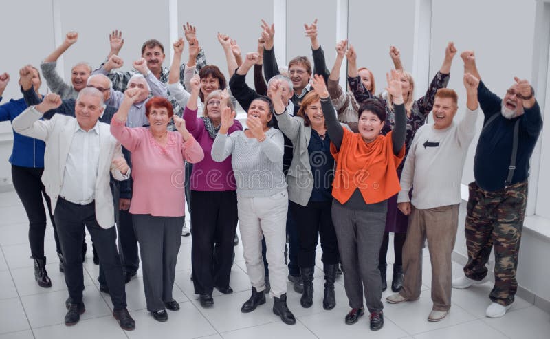 Large Group of Happy People Applauding Thier Team Victory Stock Photo ...