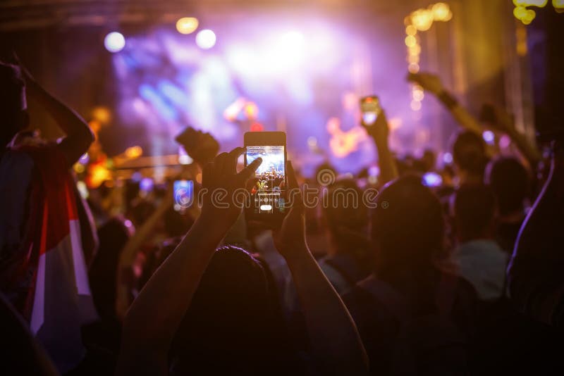 Large Group of Happy People Enjoying Rock Concert. Stock Image - Image ...