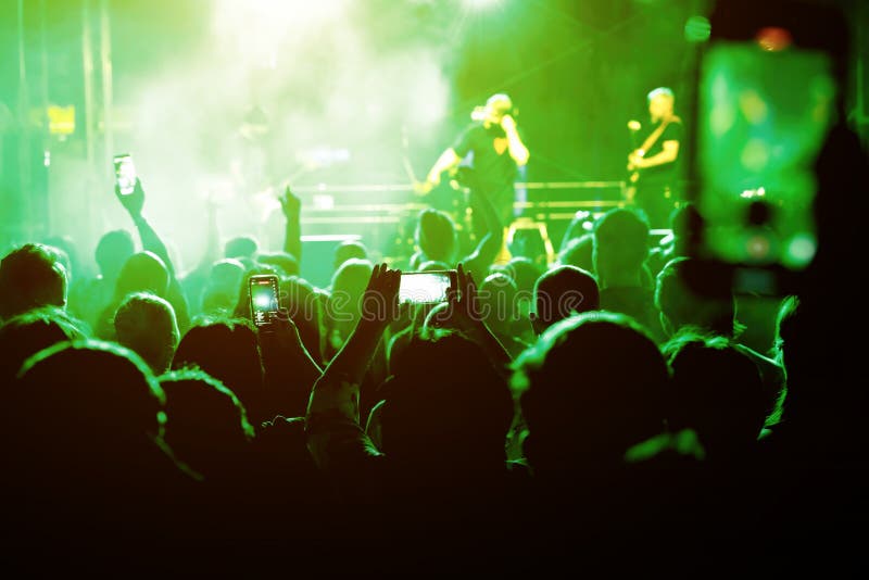 Large Group of Happy People Enjoying Rock Concert. Stock Image - Image ...
