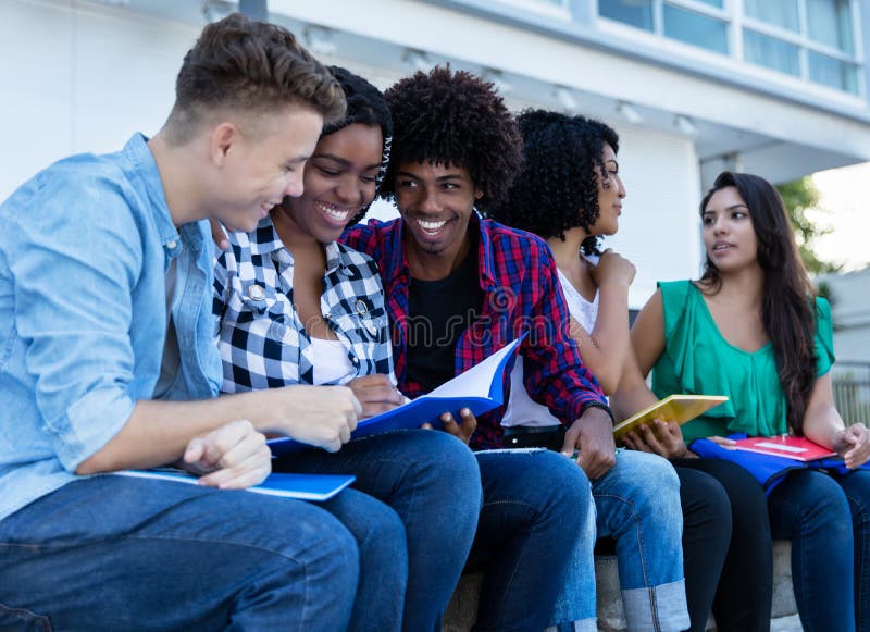 Large Group of International Students Learning Outdoors on Campus Stock ...