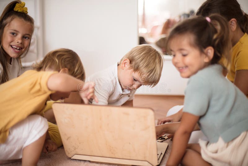 Large Group of Kids Playing Interactive Games Stock Image - Image of ...