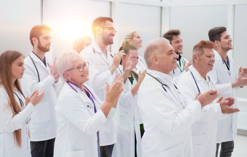 Large Group of Medical Practitioners Applauding Together. Stock Photo ...